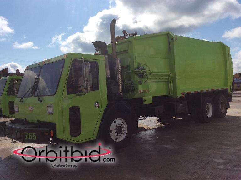 Orbitbid.com® | 2006 CCC Dual axle LaBrie Side Loader...