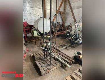 Orbitbid.com® | (1) well driller with pipe and gas motor.