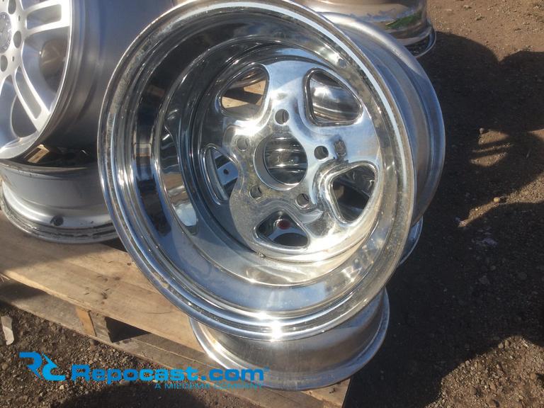 Repocast.com® | (2) 15x10 chrome rims 5 lug.