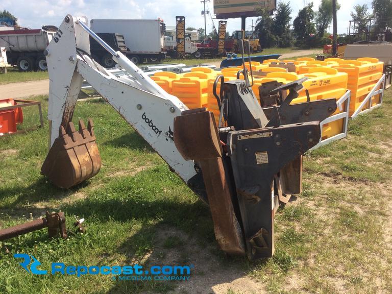Repocast.com® | Bobcat 811 Backhoe Skidsteer...