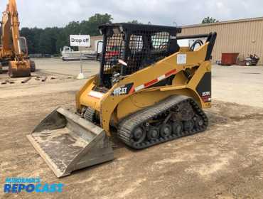 Repocast.com® | Caterpillar 257 Track Skid Steer Loader