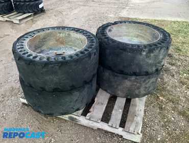 Repocast.com® | (4) Used Solid Rubber Skid Steer Tires...