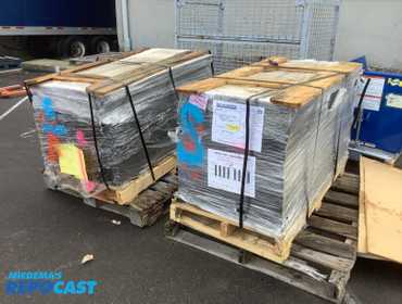 Repocast.com® | (2) Skids of black plastic shrinkable...