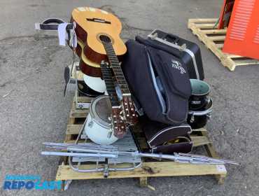 Repocast.com® | Skid of assorted musical instruments,...