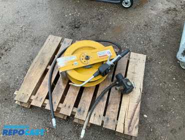 Repocast.com® | Graco oil hose reel with a Samson oil...