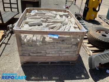 Repocast.com® | Wooden crate full of veneer stone.