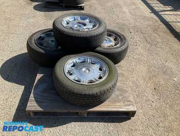 Repocast.com® | Lot of (4) Chrysler rims with tires....