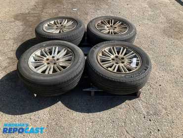 Repocast.com® | Lot of (4) Chrysler rims with tires....