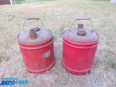 Repocast.com® | Lot of (2) Red Gas Cans - 11”Diameter...