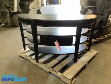 Repocast.com® | Black Curved Table with Shelves and a...