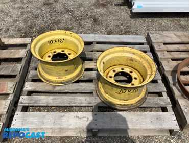 Repocast.com® | Two John Deere front tractor wheels,...