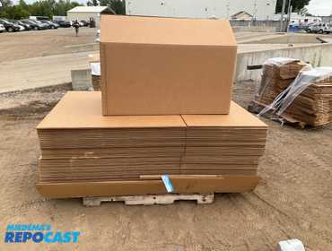 Repocast.com® | Skid of 48”x29”x 26” cardboard boxes.