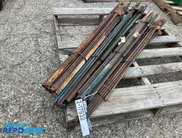 Repocast.com® | Skid lot of metal lawn fence posts,...