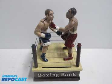 Repocast.com® | Cast iron mechanical boxing bank....