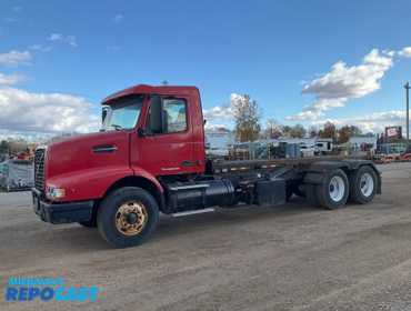 Repocast.com® | 2002 Volvo VHD Tandem Axle Roll Off...