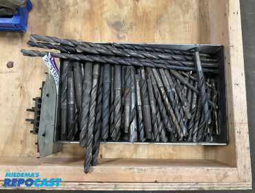 Repocast.com® | Bin full of assorted drill bits