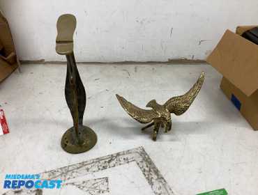 Repocast.com® | Brass foot rest w/ brass eagle.