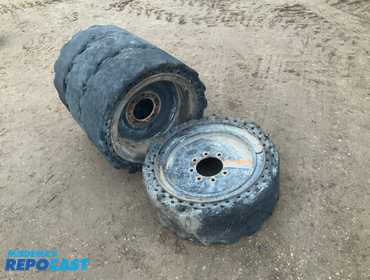 Repocast.com® | (4) Used Solid Rubber Skid Steer Tires...