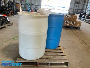Repocast.com® | Lot of (2) 55 gallons barrels; blue...