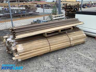 Repocast.com® | Skid of wooden trim pieces, some in...