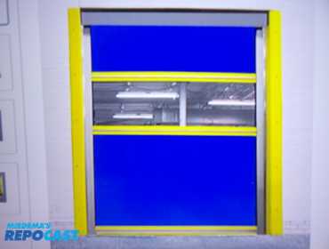 Repocast.com® | TMI motorized roll-up dock door, PVC...