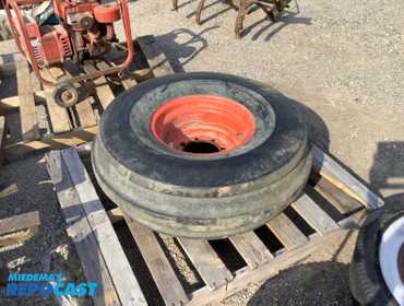 Repocast.com® | Front tractor wheel and tire in good...