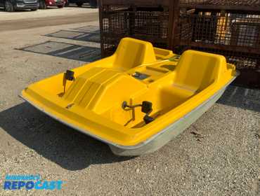 Repocast.com® | Yellow four seater plastic paddle boat...