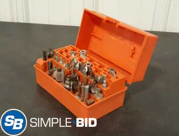 SimpleBid Inc. | Box of used router bits. Box is 7...
